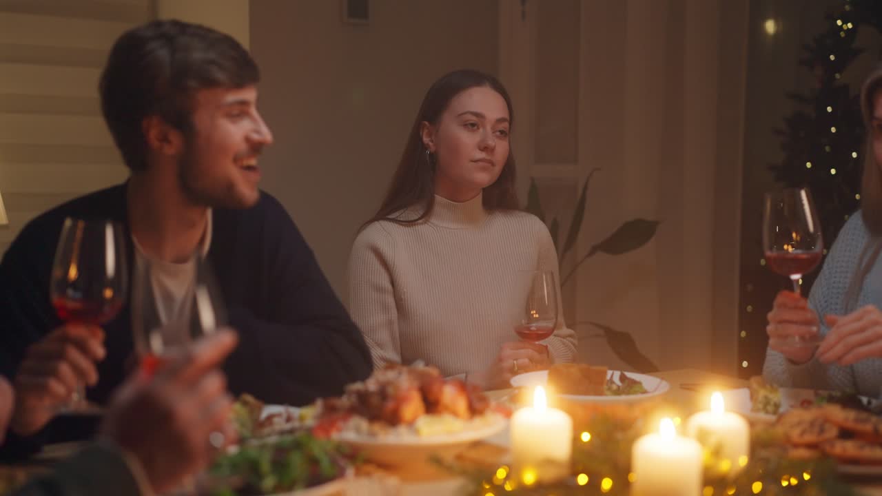 A group of people at an indoor gathering | Premium Stock Video Footage