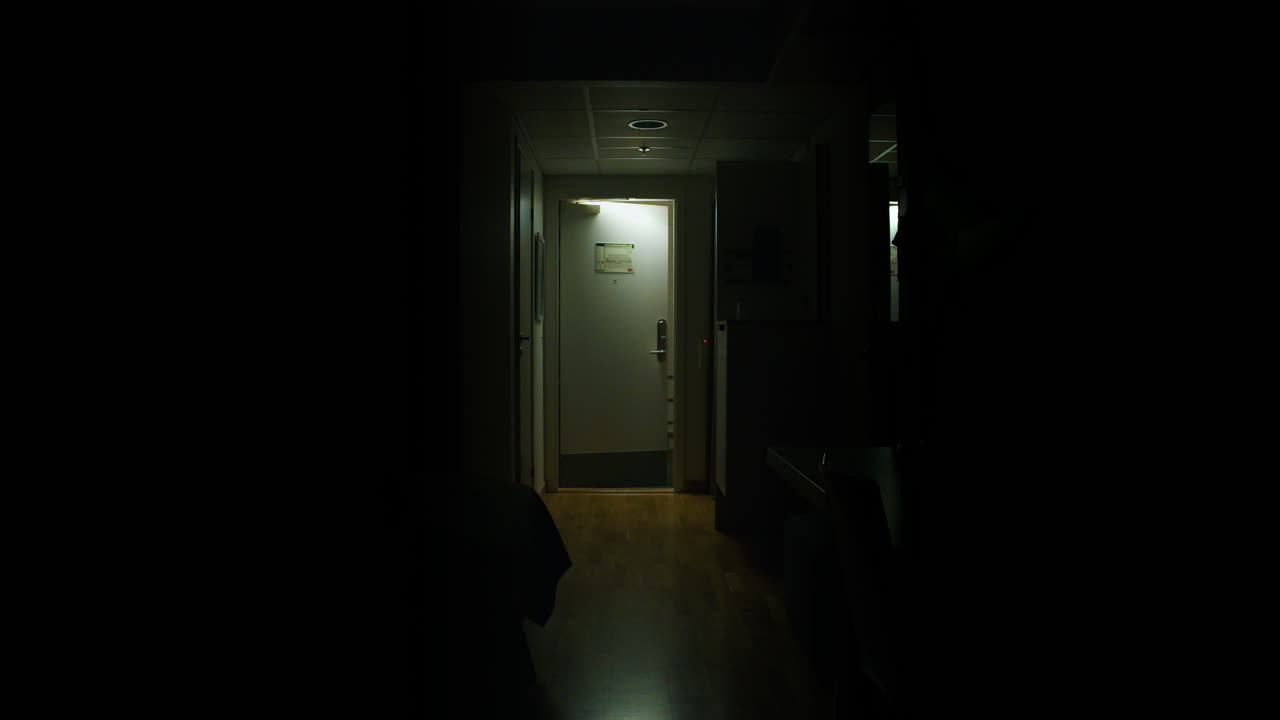 Young Man Leaving Dark Hotel Room, Not Looking Back While Door Shuts ...