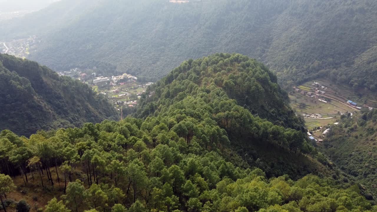 An Aerial Flight Over The Forested Foothills Of The Himalaya Mountains ...