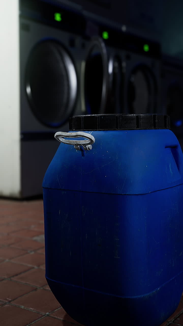 Premium stock video - Blue barrel of laundry detergent in a commercial ...