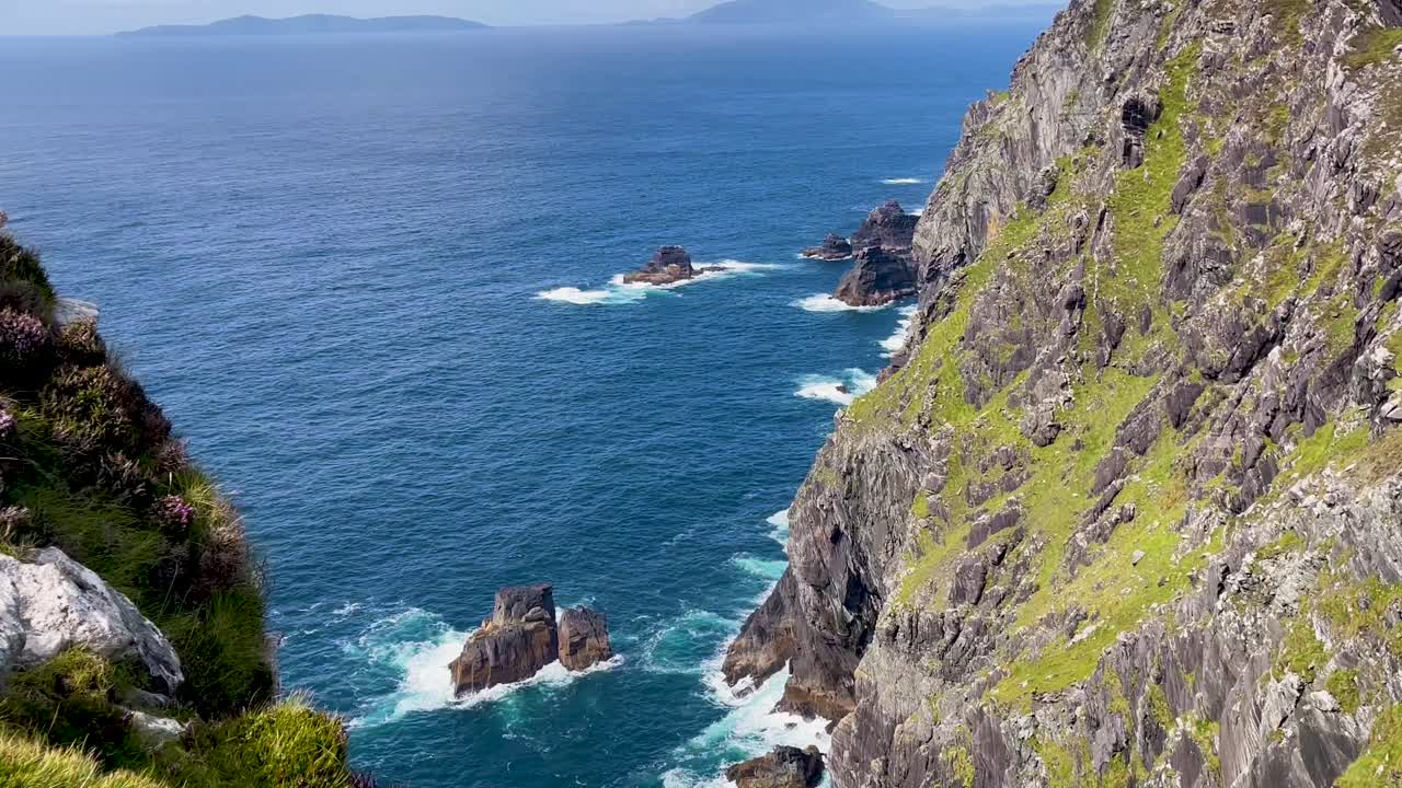 A 4k look at the spectacular kerry cliffs 500 feet high looking at ...