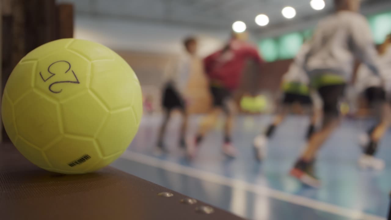 Static shot of a yellow handball Premium Stock Video Footage