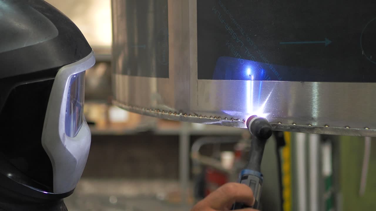 Premium stock video - Welder, using vig, tig, mig mag method to welding ...