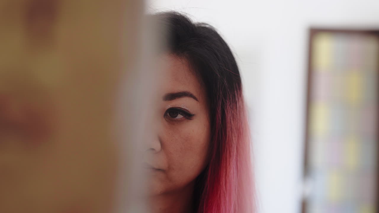 Premium stock video - Deadpan expression painting a visual canvas by korean