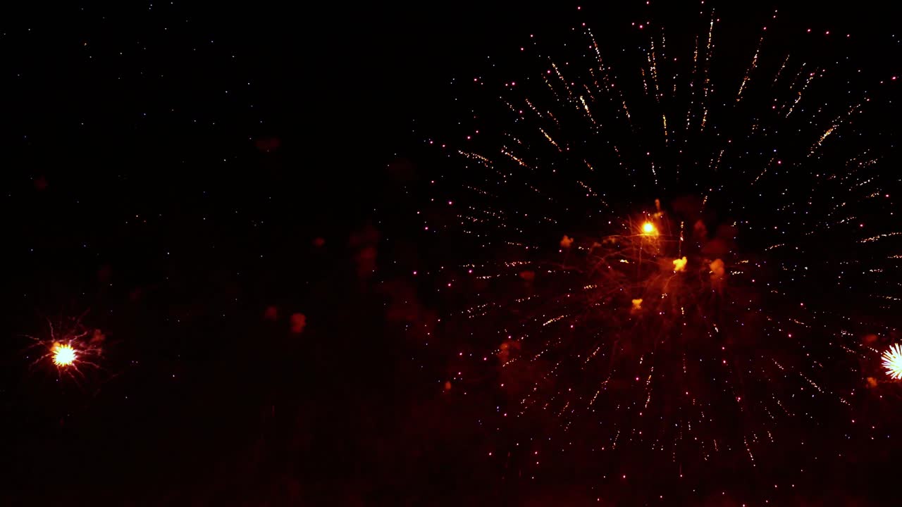 Premium stock video - Colorful fireworks exploding in the night sky ...