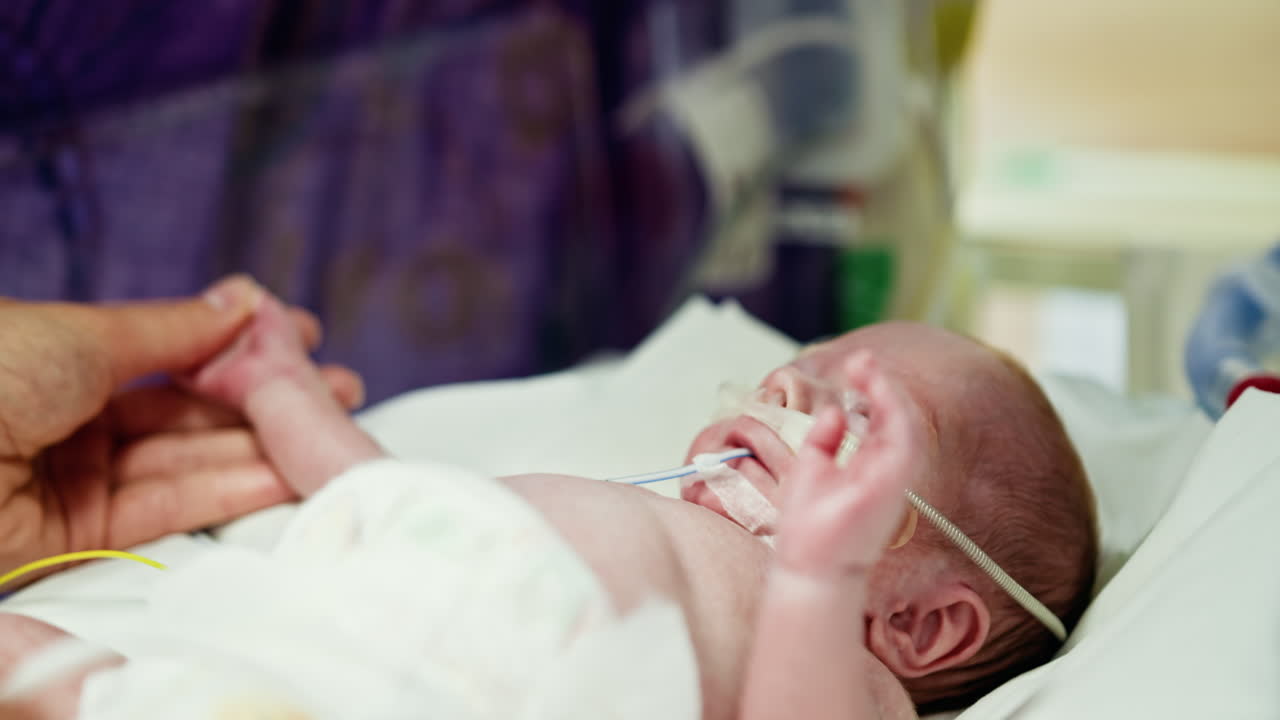 Hospitalized Baby Receiving Care | Premium Stock Video Footage