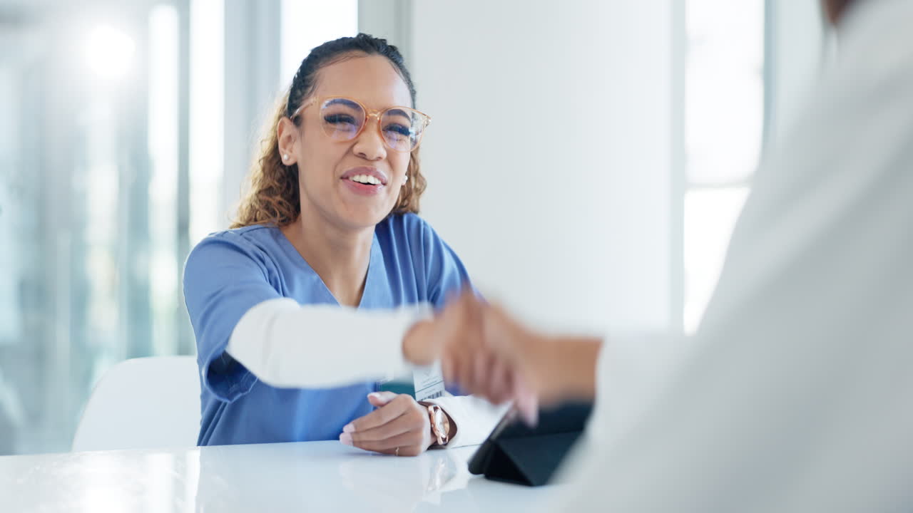 Premium stock video - Handshake, interview and doctor hiring