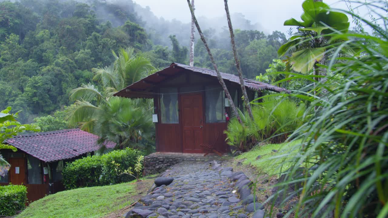 Premium stock video - Costa rica bungalow hut at a river lodge in the ...