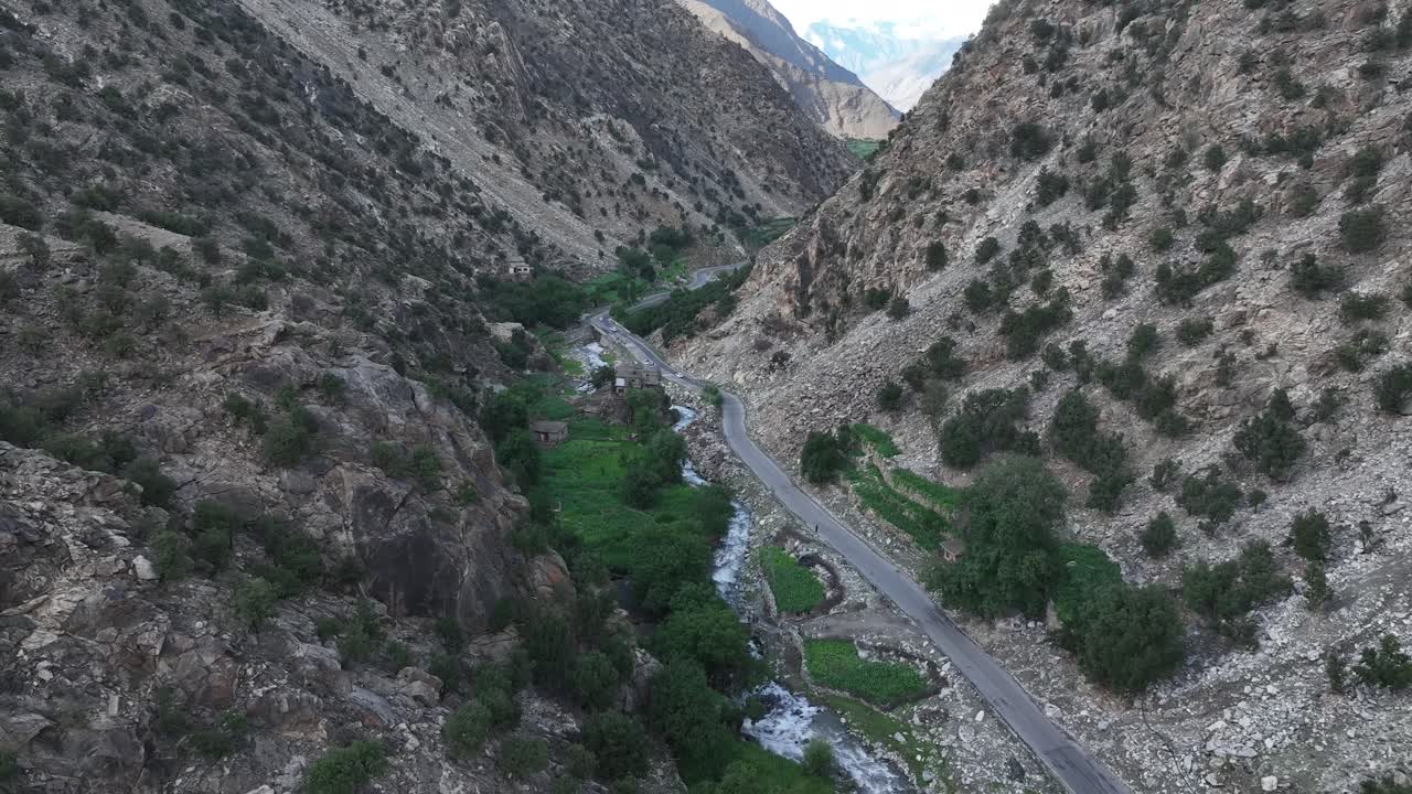 A drone's view of a beautiful highway and river in chilas valley, gb ...