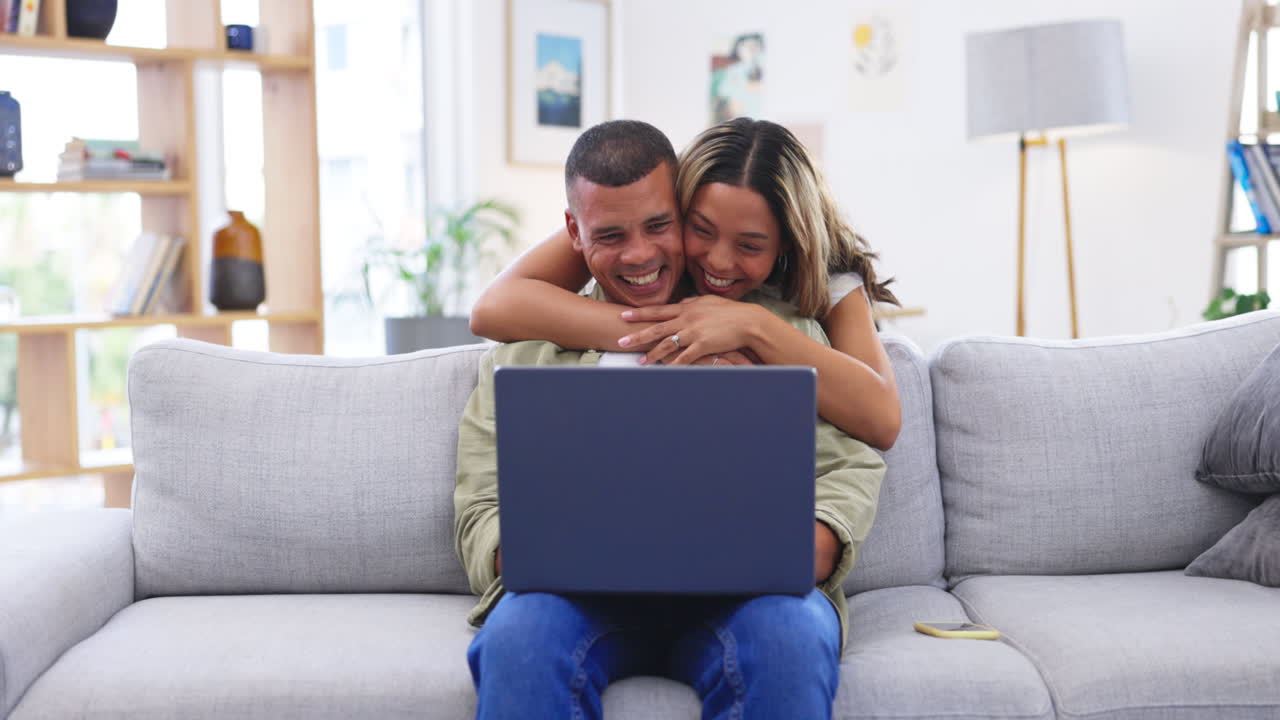 Laptop, Hug And Couple Smile On Sofa In Home Free Stock Video Footage ...