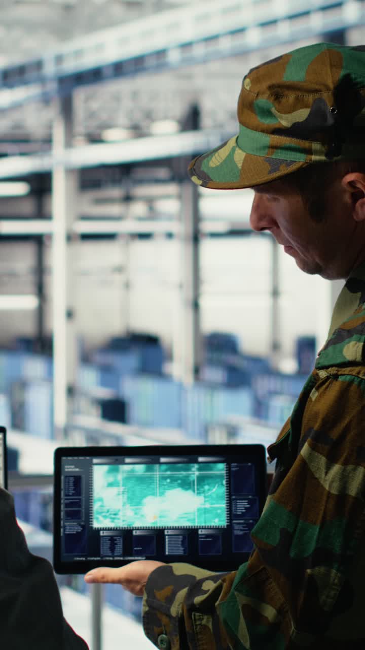 Vertical Video Military Commander And Female Programmer In Data Center ...