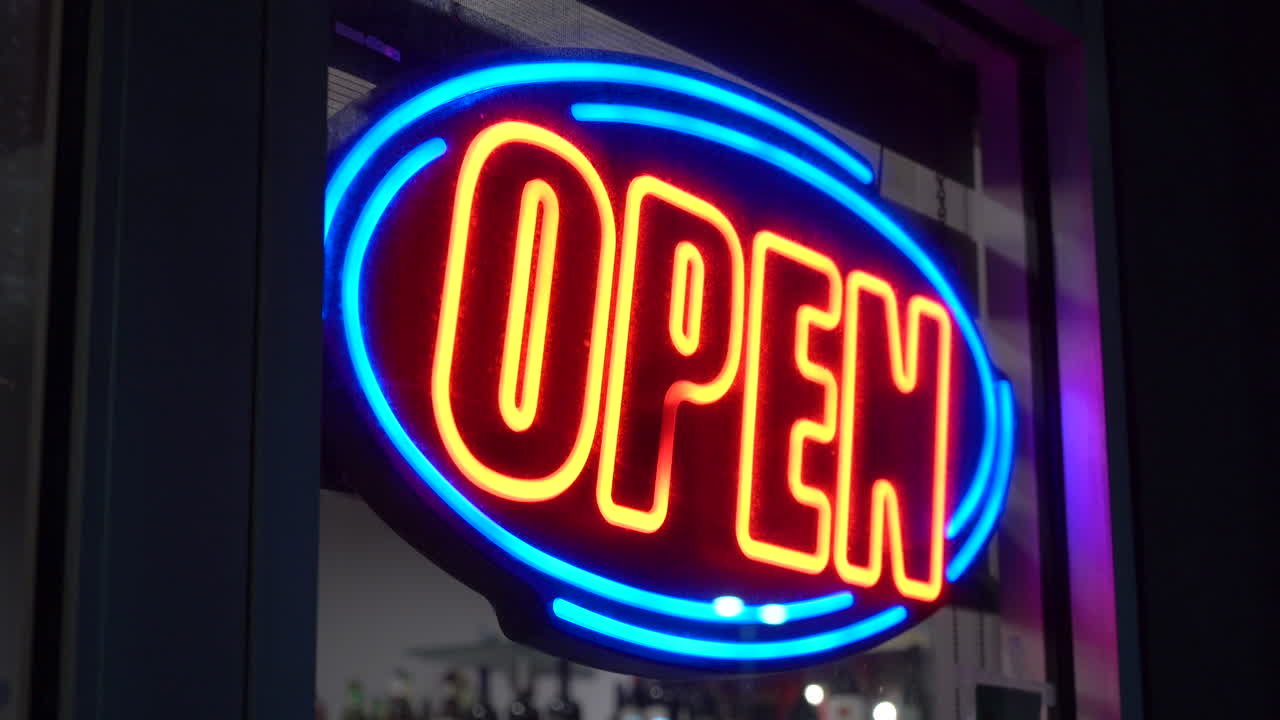 Flashing neon business open sign -- 4k Premium Stock Video Footage