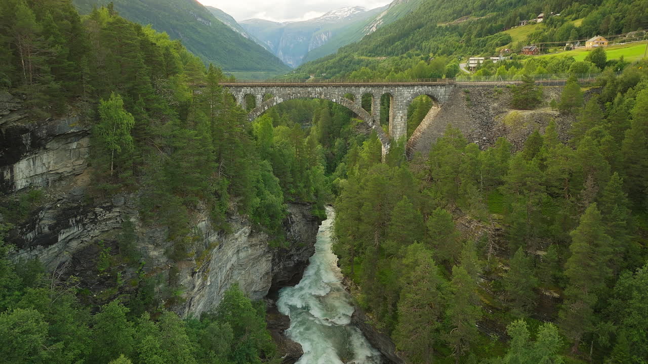 Scenic kylling stone bridge spanning rauma river in romsdalen valley ...