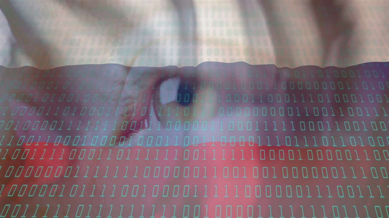 Premium Stock Video Typing On Keyboard Binary Code Animation Overlaying Person Using Computer