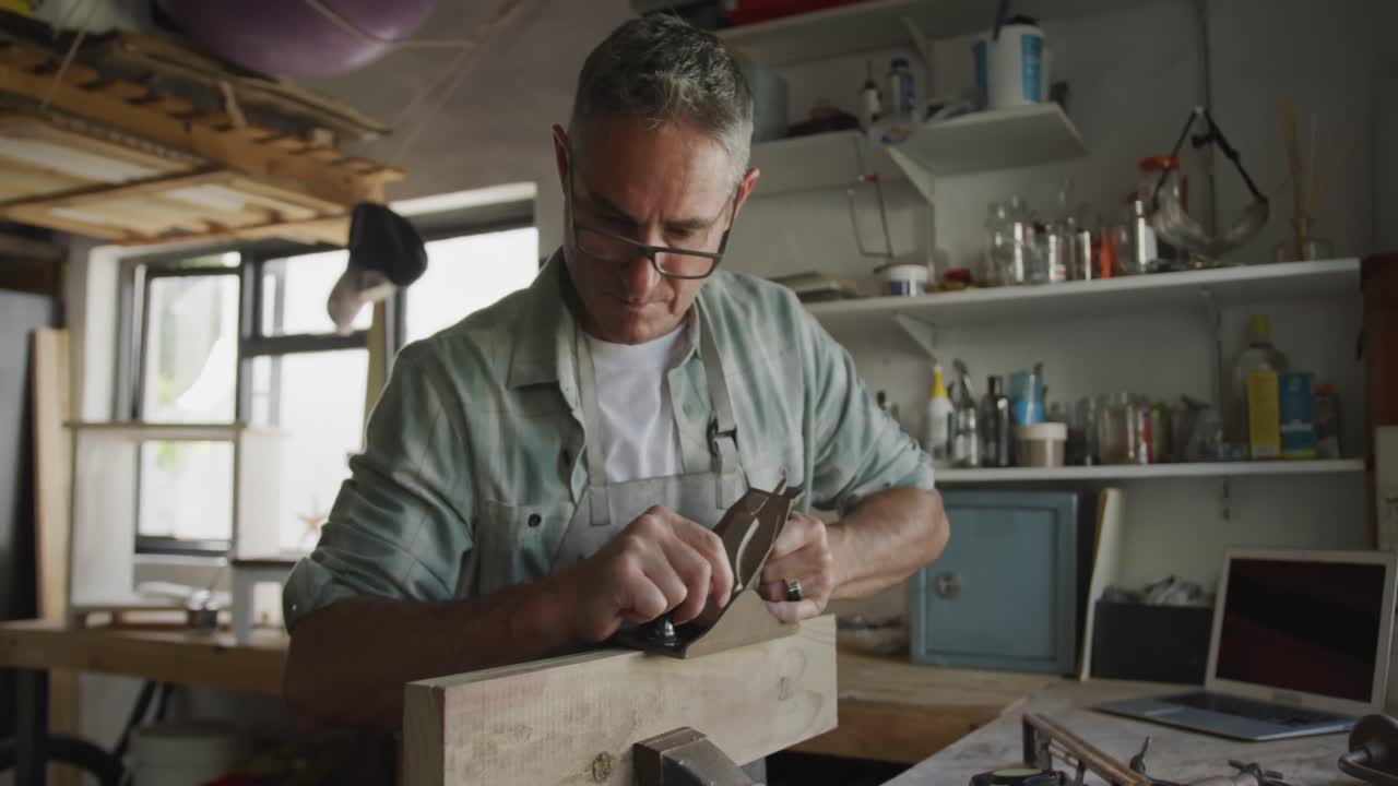 Premium stock video - Man doing diy at home