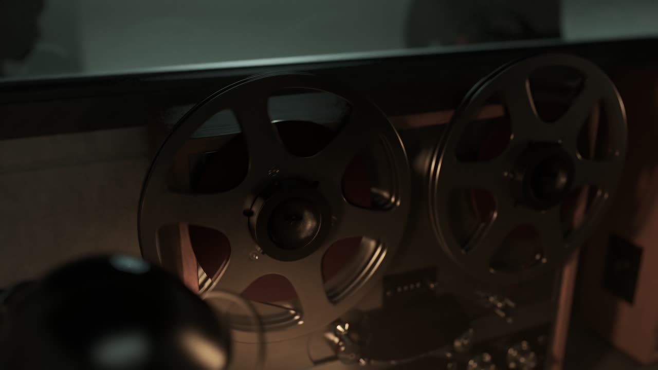 Interrogation room behind one-way mirror glass. reel to reel recording ...