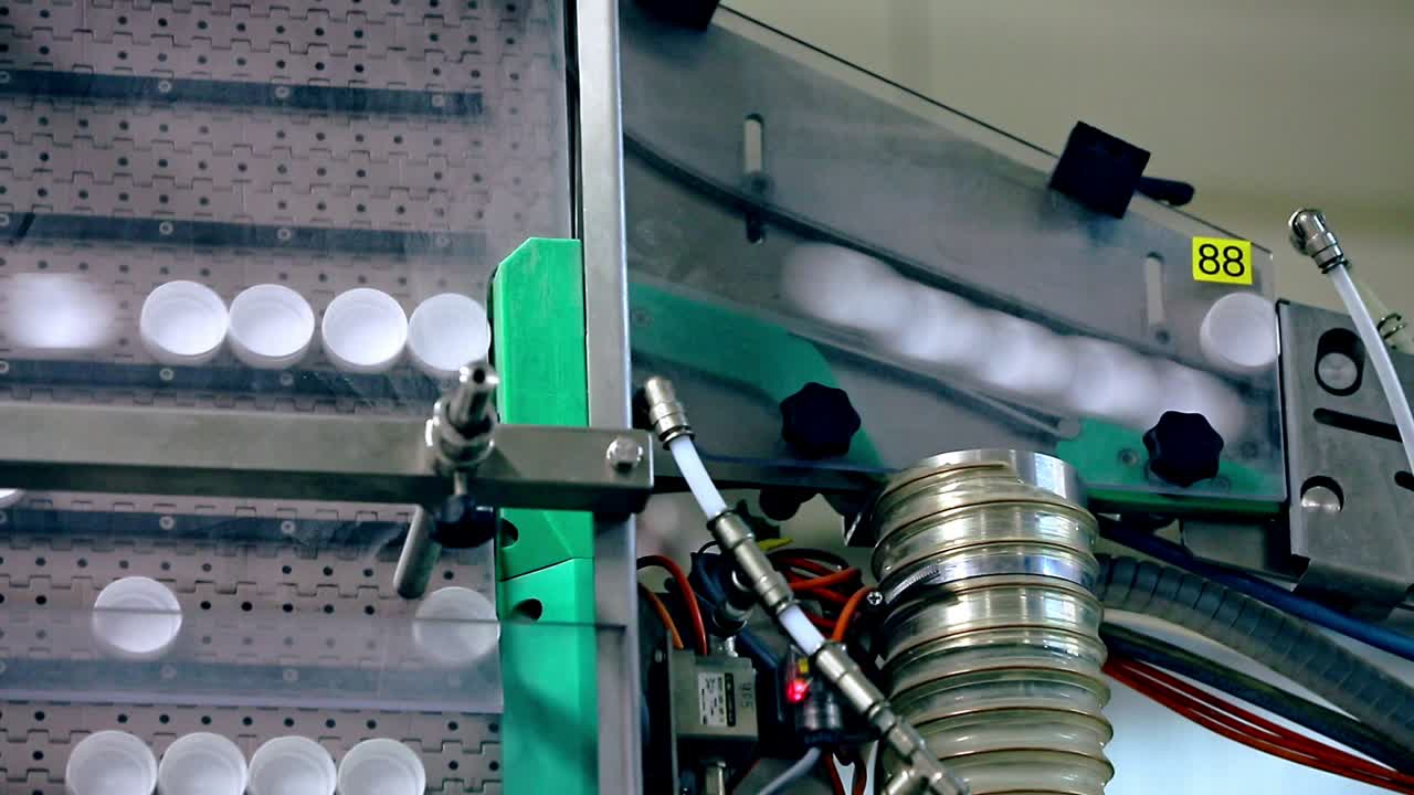 Plastic Caps Manufacturing Line. Modern Factory Manufacturing Process ...