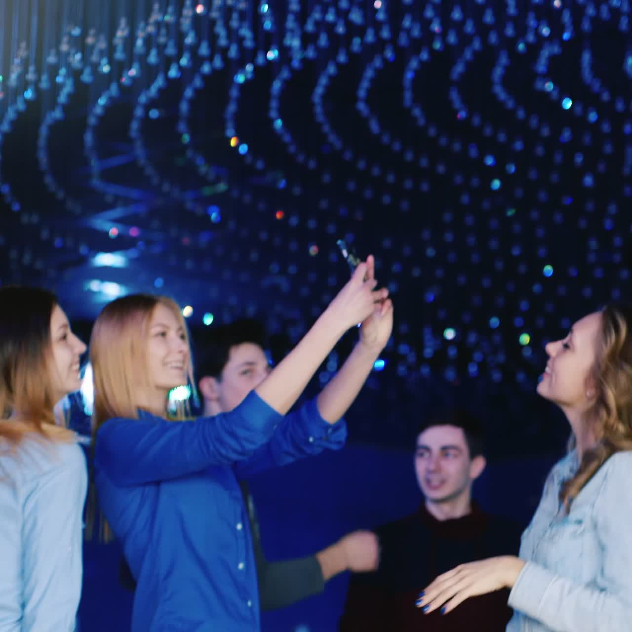 Premium stock video - Young people dancing in a disco club 8