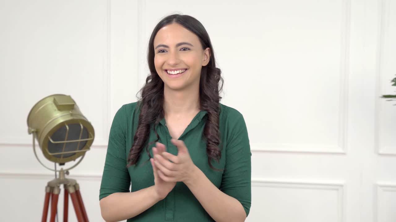Indian woman clapping and cheering | Premium Stock Video Footage