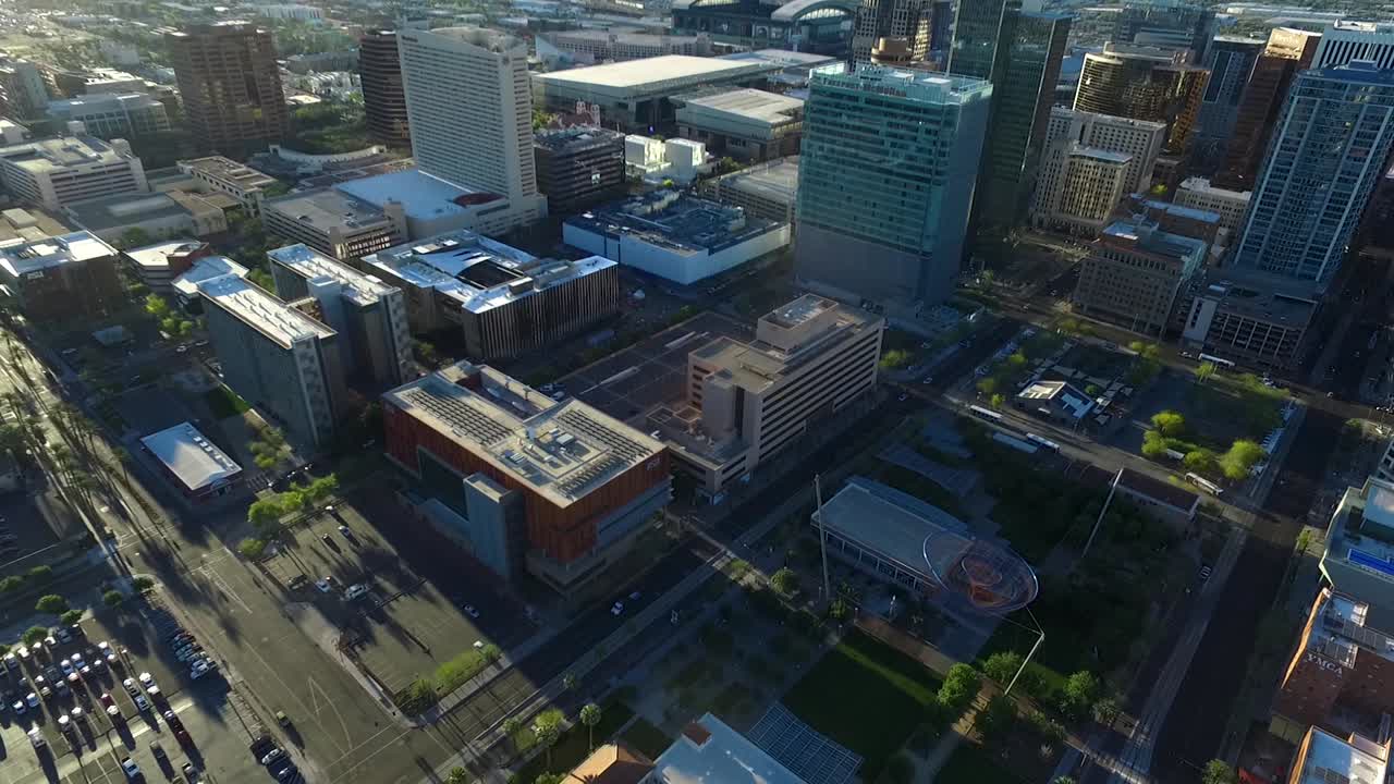 Panning wide aerial of the downtown blocks in Phoenix, Arizona ...