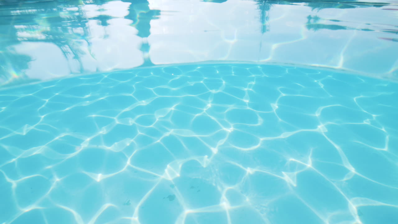 Underwater view of an outdoor swimming pool in France. Sunny day ...