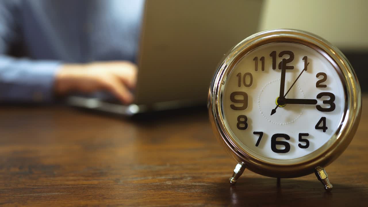 The clock shows three o'clock in the afternoon. Working hours are in ...