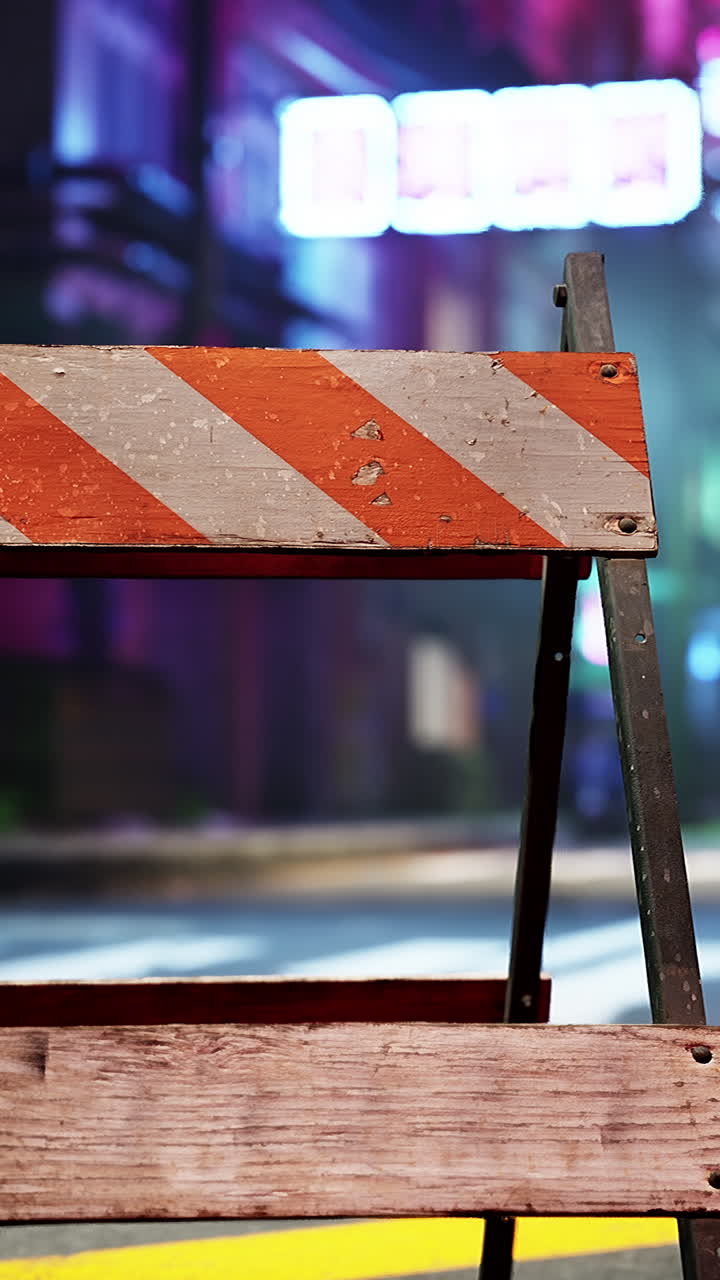 A close up of a barricade in a city street at night Premium Stock Video ...