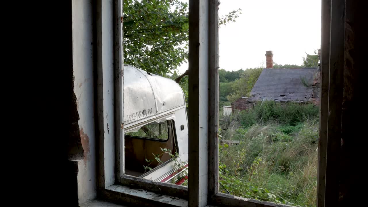 Panning shot through the window of an abandoned house | Premium Stock ...