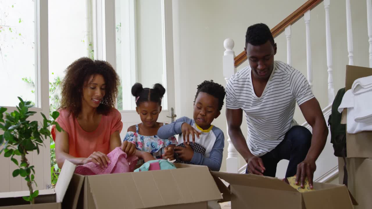 Family moving in to a new home Free Stock Video Footage