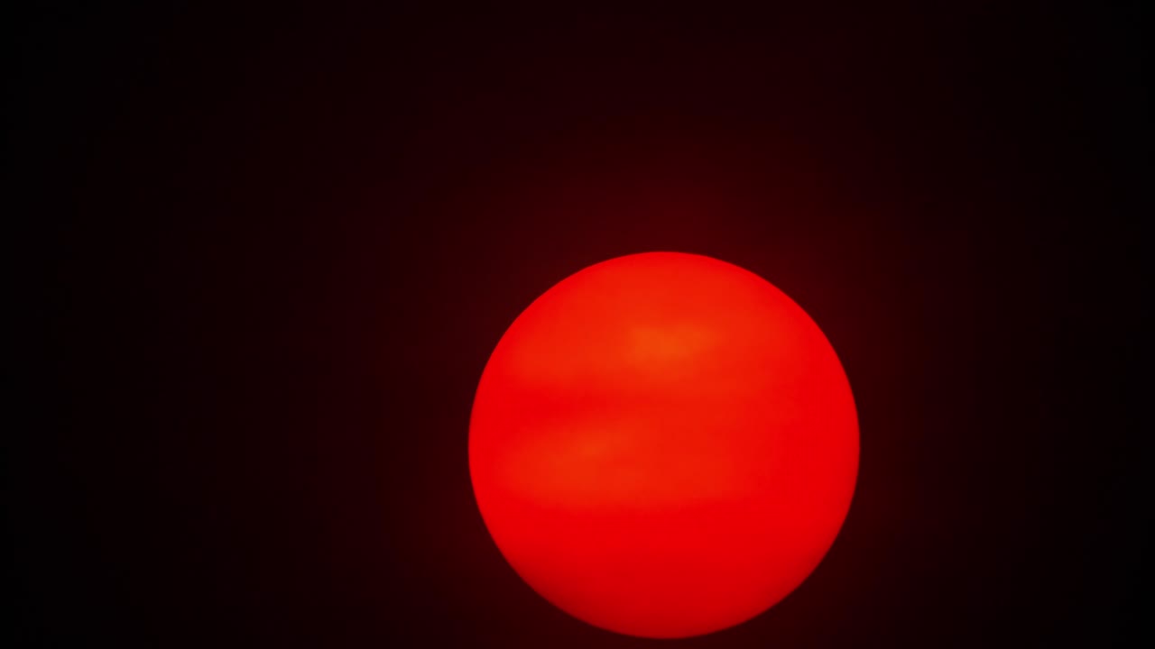 Red sun sphere in thick smog | Premium Stock Video Footage