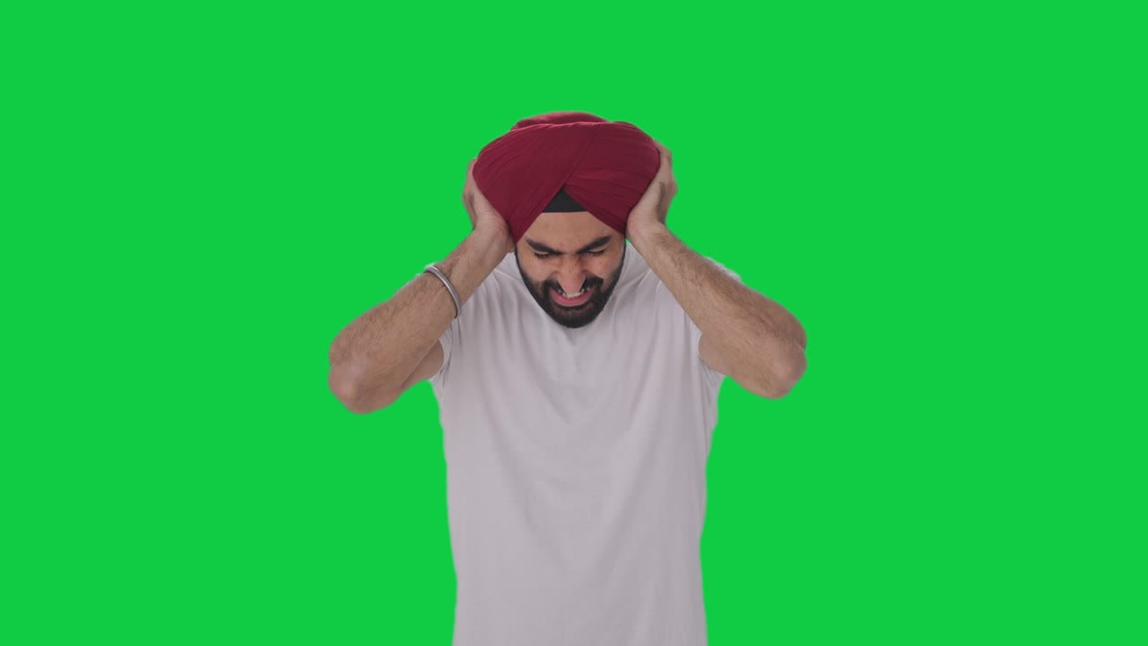 Premium stock video - Angry sikh indian man shouting with closed ears ...