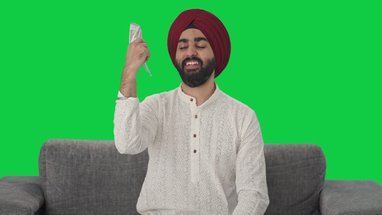 Happy Sikh Indian Man Using Money As Fan Green Screen Free Stock Video ...