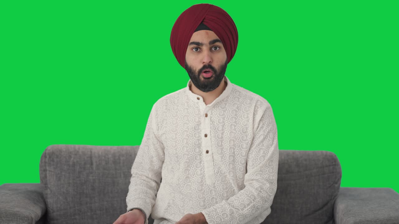 Premium stock video - Angry sikh indian man shouting to someone green ...
