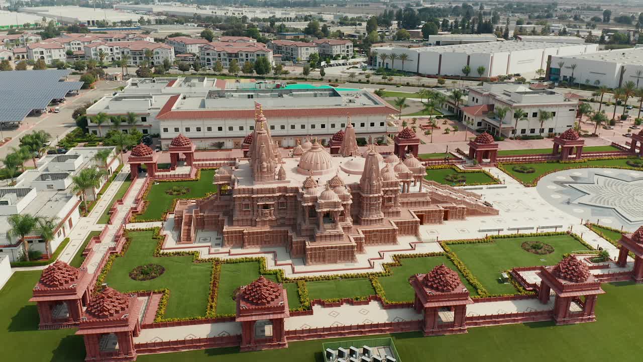 Aerial side view of the baps shri swaminarayan mandir temple in chino ...