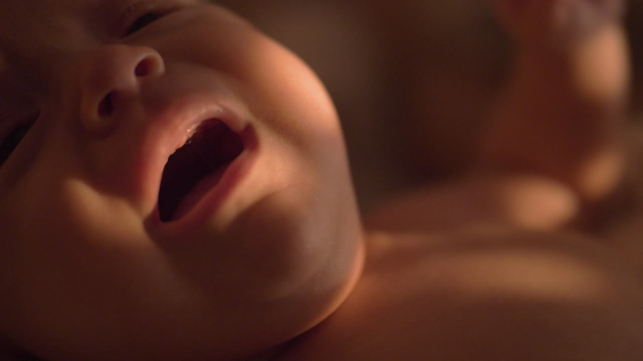 Premium stock video - Baby girl of three months is crying