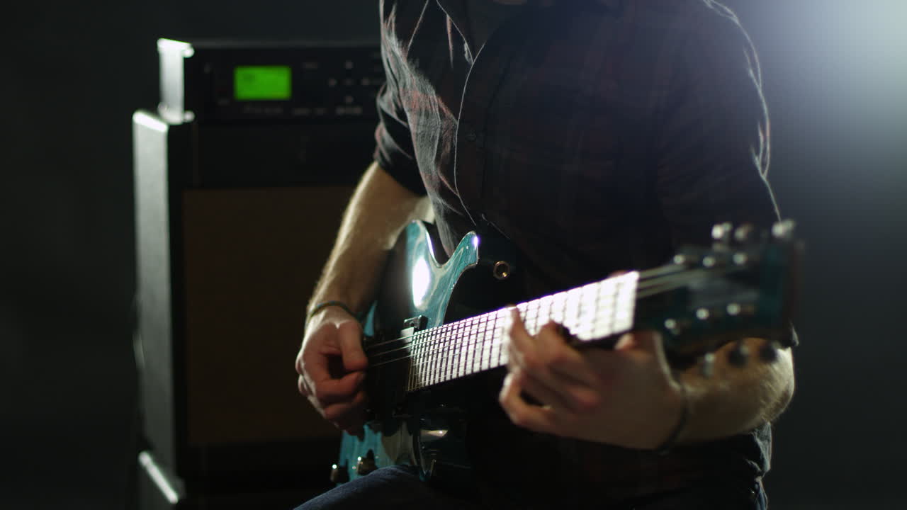 Close Up Of Man Playing Electric Guitar Shot On R3D | Premium Stock ...