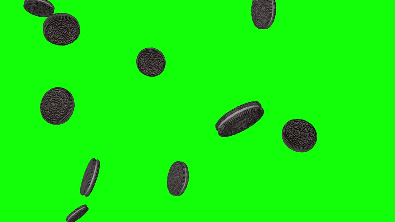 Premium stock video - Oreo cookies falling green screen