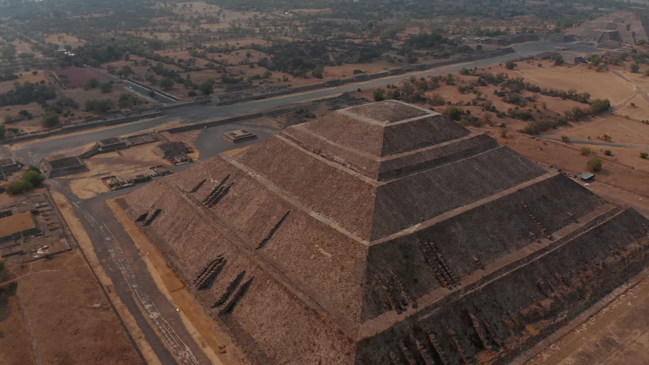 Premium stock video - Backwards reveal of ancient huge pyramid. tilt up ...