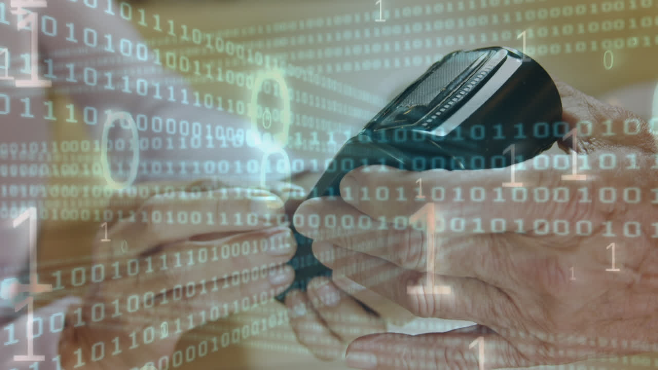 Premium stock video - Animation of binary code over hands of caucasian ...