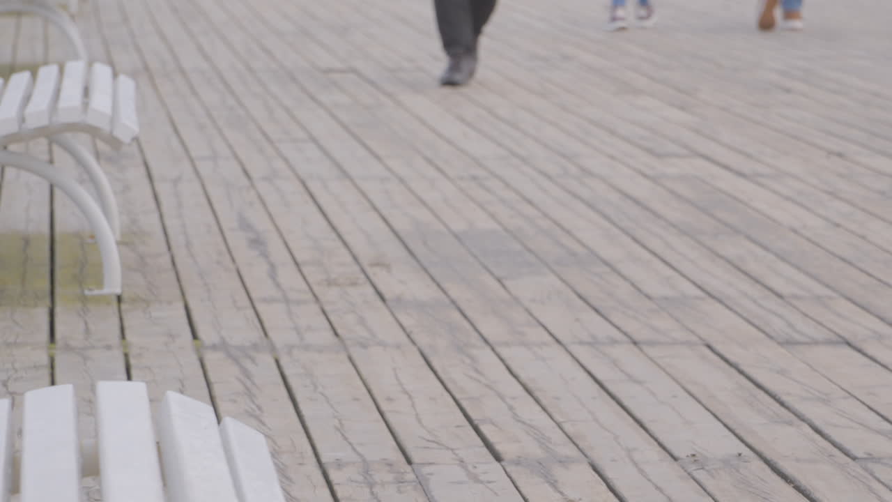 Premium stock video - Walking at wooden promenade at redlowo seaside in ...