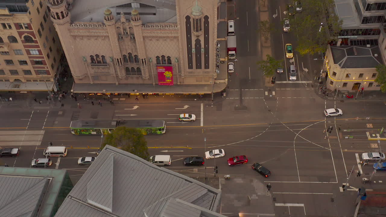 Static Aerial Of Traffic Moving Through Busy City Street Environment ...