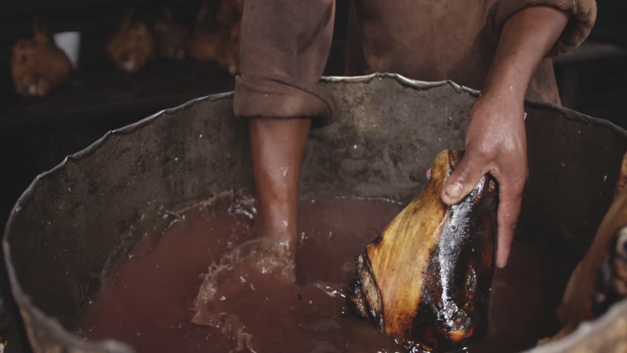 African man washing the meat Free Stock Video Footage