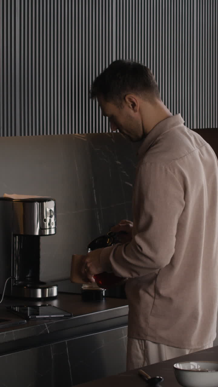 Man making coffee in the kitchen | Free Stock Video Footage