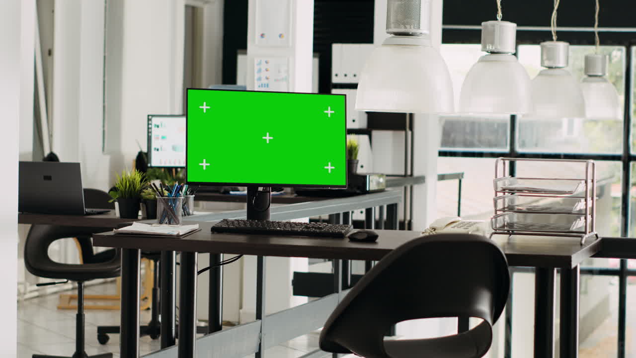 Premium stock video - Greenscreen monitor in coworking space