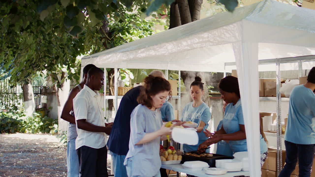 Premium stock video - Feeding the needy: community support