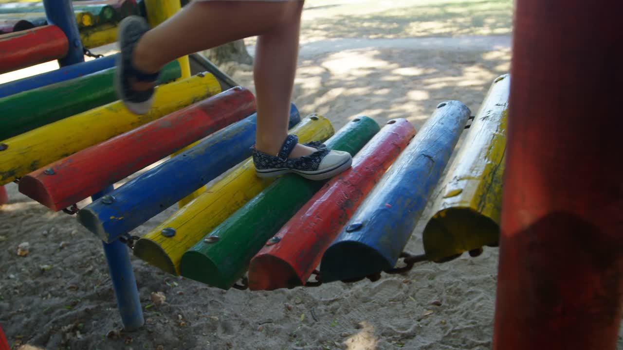 Premium stock video - Kids playing in the playground 4k