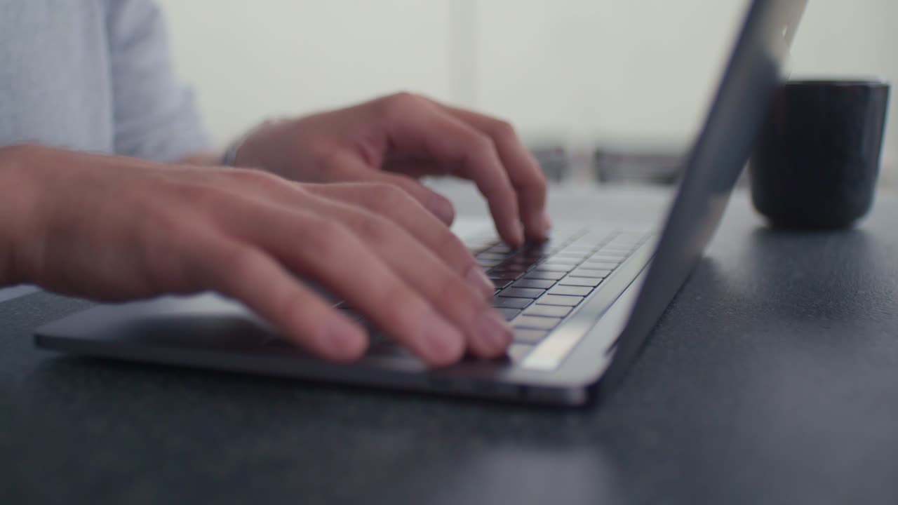 Premium stock video - Close up of writing with laptop