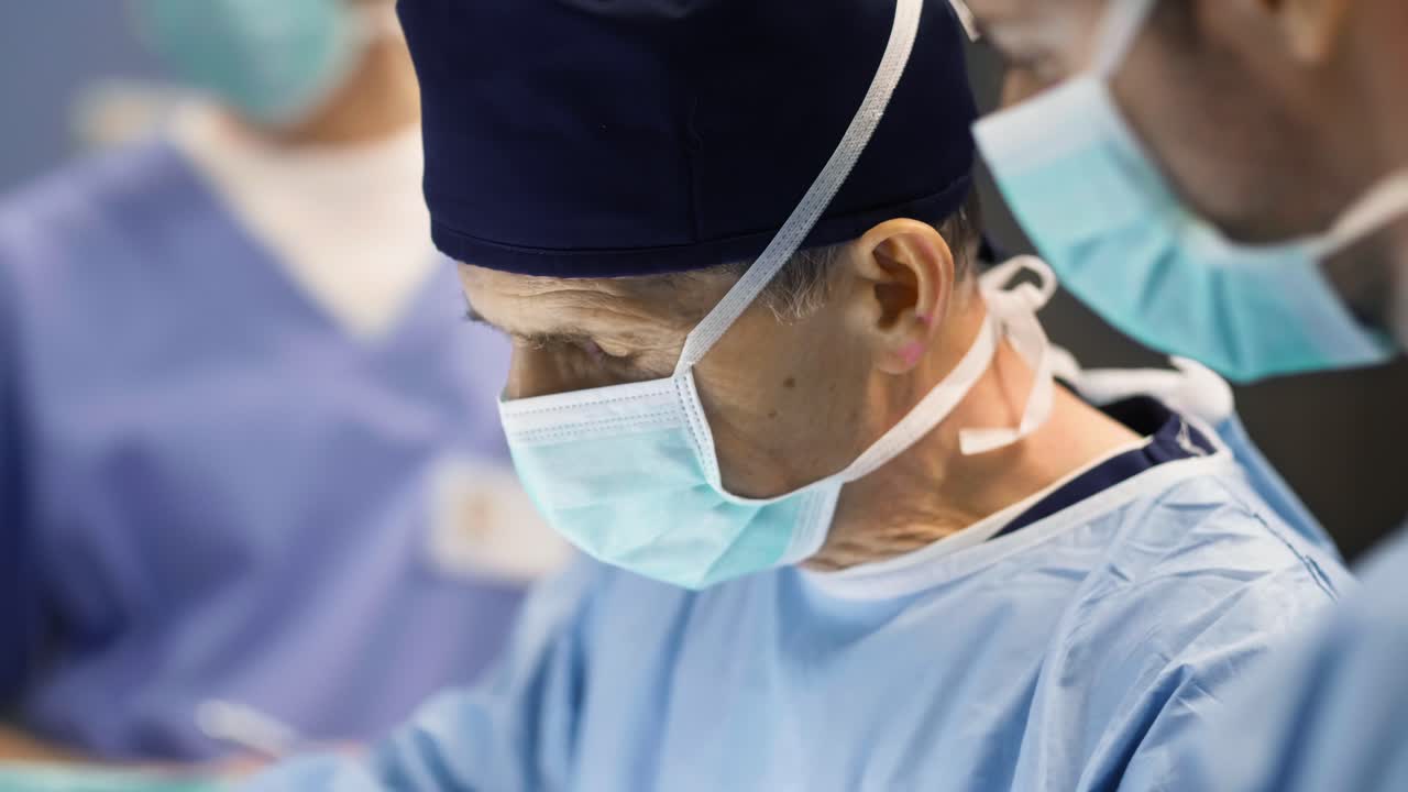 Conversation Between Two Male Surgeons During An Operation Free Stock ...