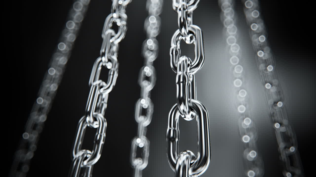 Premium stock video - Close up of shiny silver chains