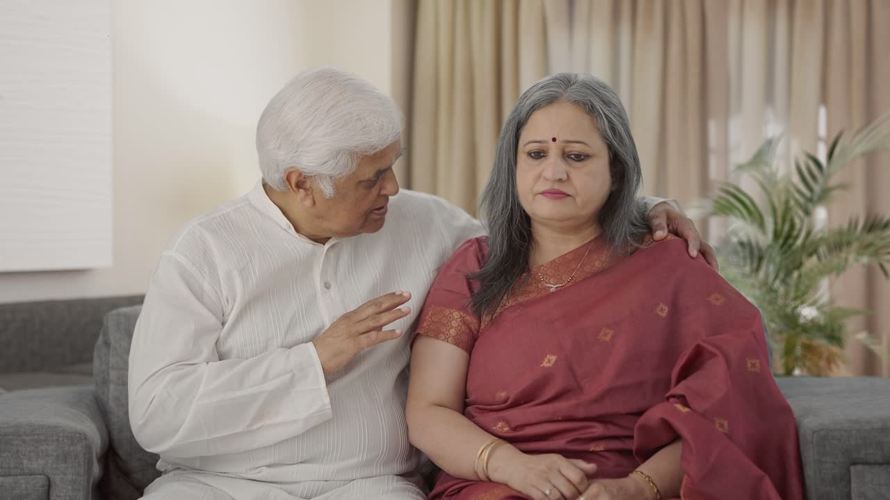 Premium stock video - Indian old couple talking to each other